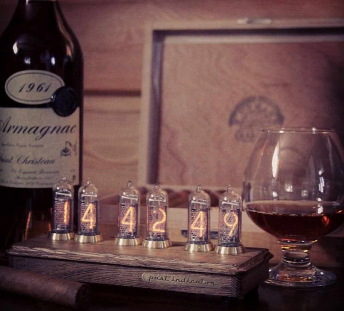 This gorgeous desk clock is made with vintage Soviet Union Nixie tubes