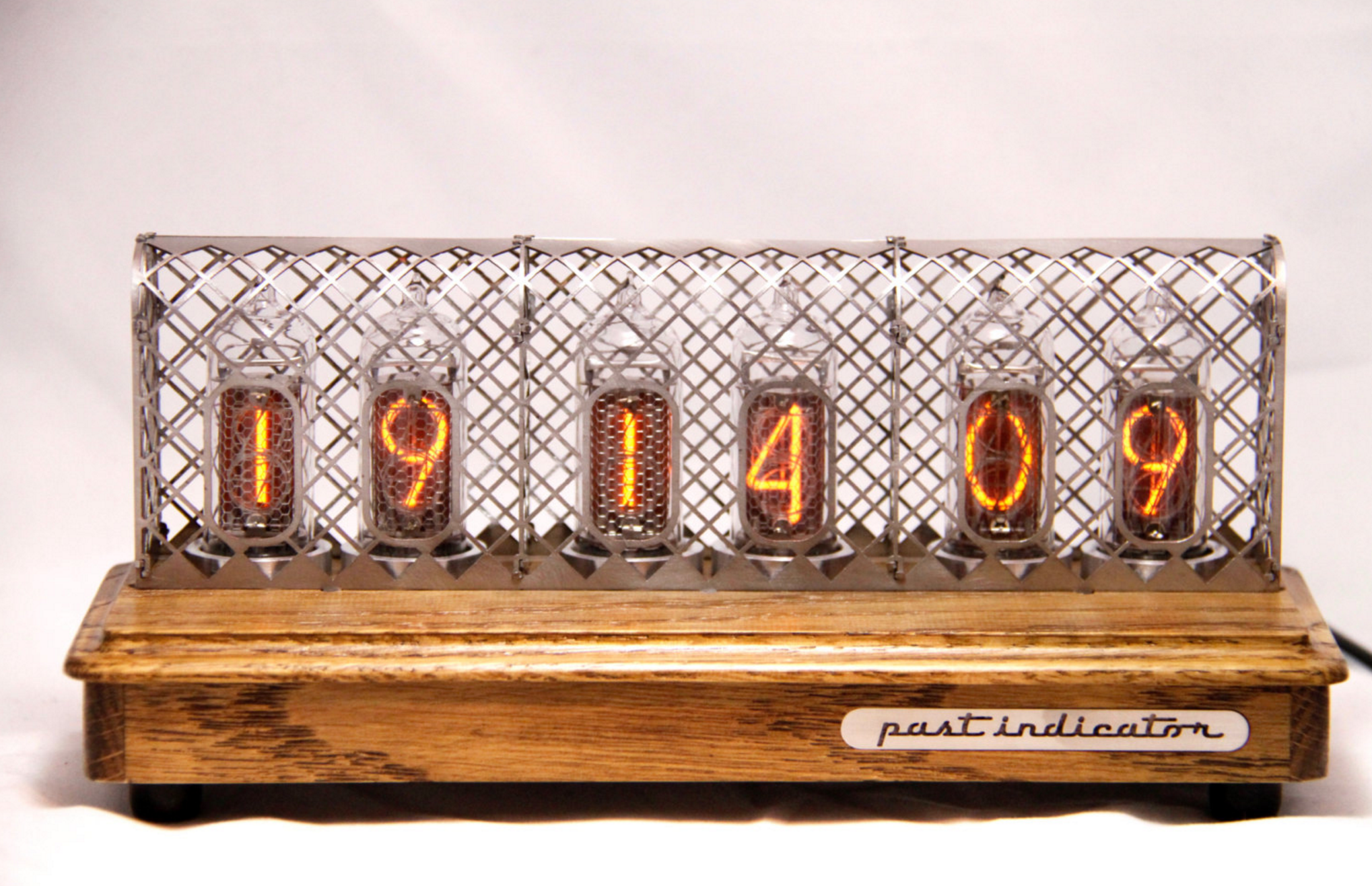 This gorgeous desk clock is made with vintage Soviet Union Nixie tubes