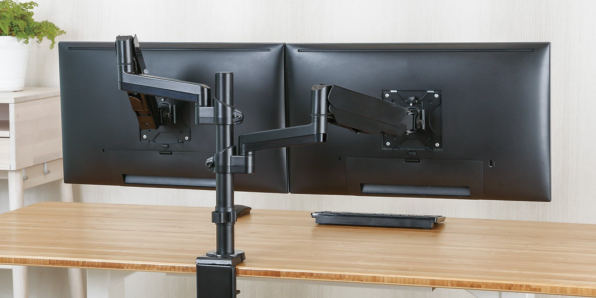 This dual arm stand simplifies your multi-monitor setup for $55 shipped ...