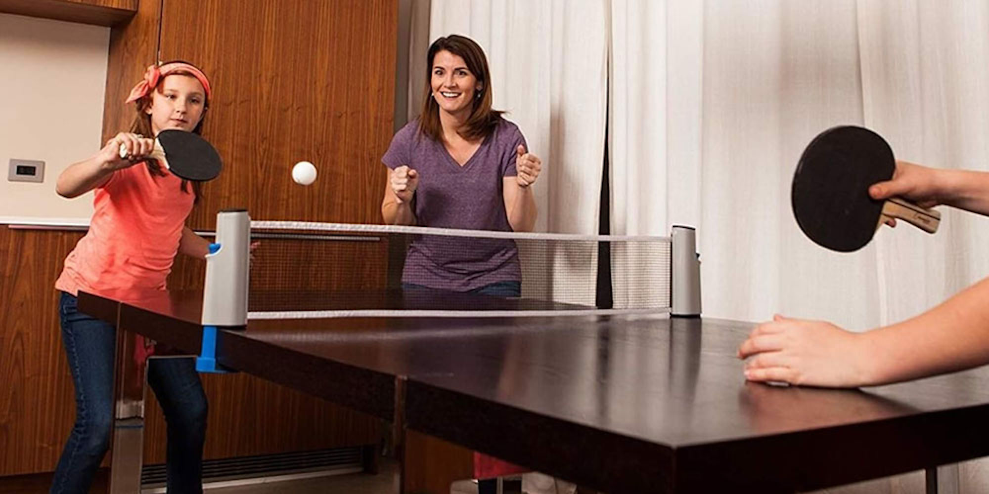 Play ping pong against family on any table with this portable set: $37 ...