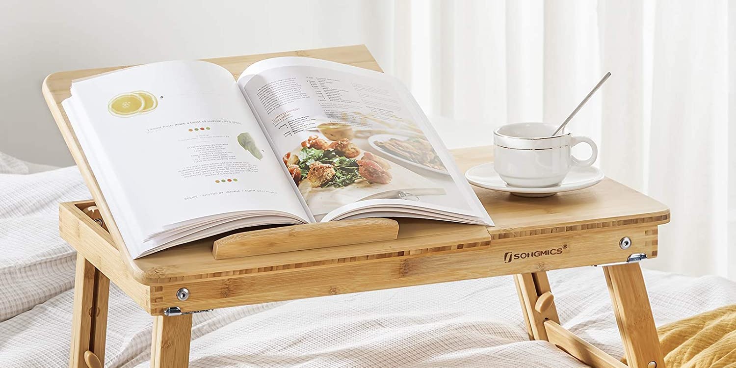 This highly-rated bamboo lap desk has a built-in MacBook stand, side ...