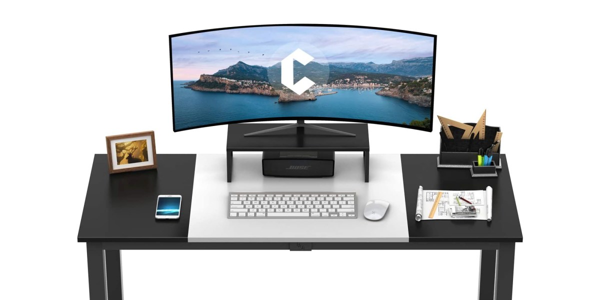 This spacious desk offers plenty of room at over five feet wide, now ...