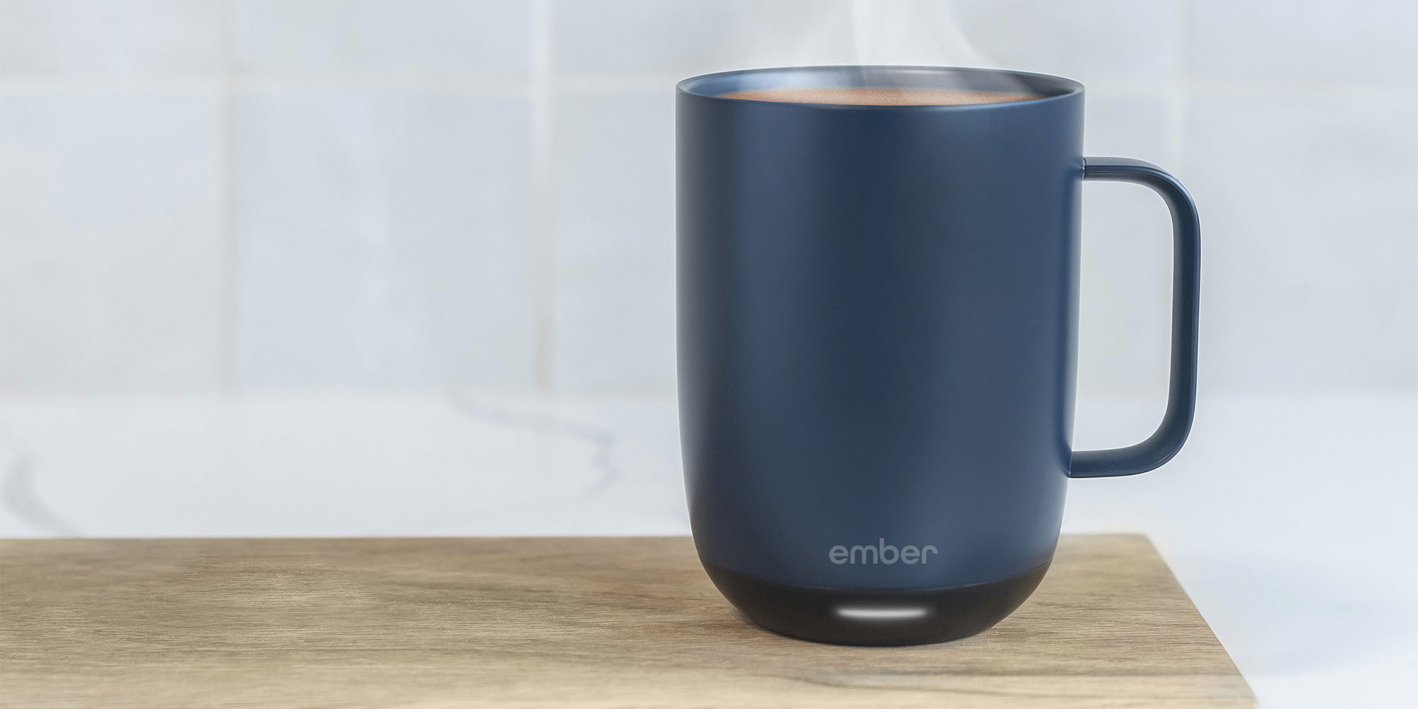 Ember's temperature control smart mug and charging coaster now $120 for ...