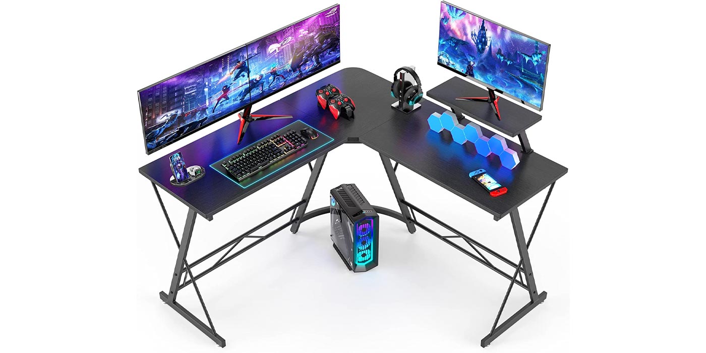 This expansive L shaped desk ships with an included monitor riser at ...