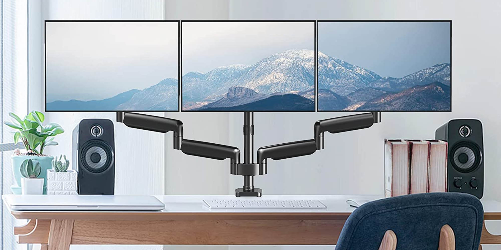 MOUNTUP's latest desk mount supports three 32-inch monitors with first ...